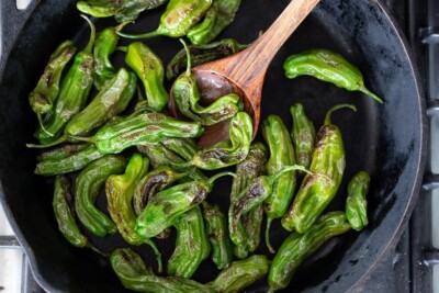 Blistered Shishito Peppers with Garlic and Sesame Seeds