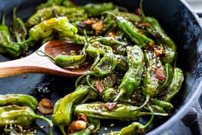 Blistered Shishito Peppers with Garlic and Sesame Seeds